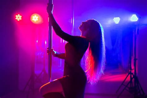 Premium Photo Pole Dance Slender Sexy Woman Dancing In The Interior