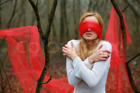 An Image Of Blindfolded Nice Woman In The Forest Stock Image Colourbox