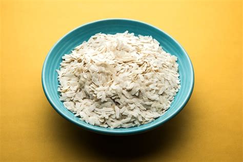 Premium Photo Raw Flattened Rice Or Thick Or Thin Rice Flakes For