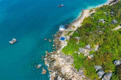 航拍海南分界洲岛崖壁民宿房间海洋海岛自然风景摄影汇图网