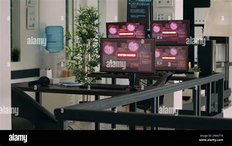 It Office With Multiple Monitors Showing Critical Error Message