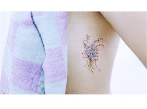 Flower Bouquet Tattoo On The Left Side Ribcage