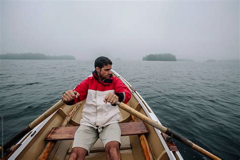 Man Rowing By Stocksy Contributor Raymond Forbes Llc Stocksy