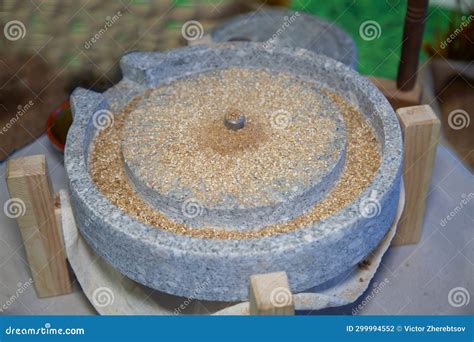 A Manual Flour Grinder Made Of Natural Stone For Grinding Buckwheat