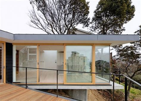 Krampon House By Shogo Aratani Climbs Over A Rocky Site