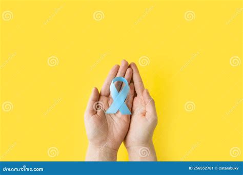 World Diabetes Day Adult Hands Holding Blue Purple Ribbon On Yellow