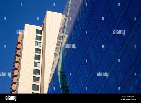Close Shot Of A Curved Blue Glass Window Wall Of A Modern And Elegant