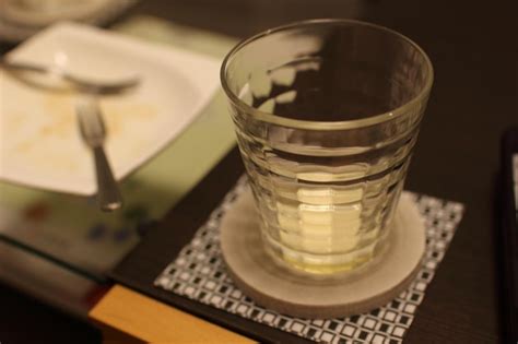 Premium Photo Close Up Of Drinking Glass On Table