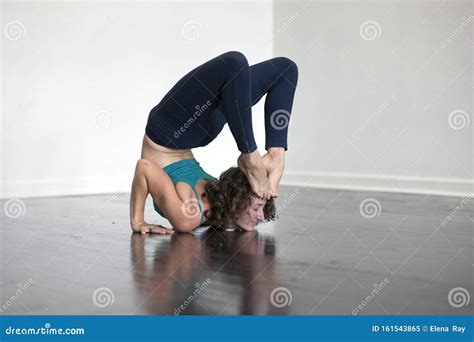Scorpion Pose With Wall