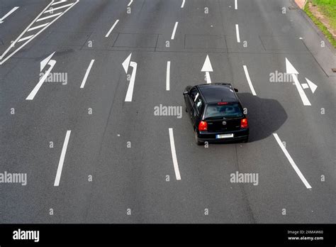 Road Markings Turning Lanes Directional Signage At An Intersection Turning Straight Ahead