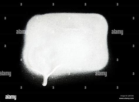 Close Up Of A White Spray Paint Rectangle Shape With Splashes And Drip