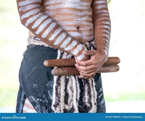 Australian Aboriginal Ceremony Human Hand Holds Ritual Clapsticks For
