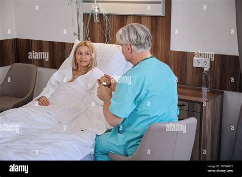 Patient Blood Oxygen Saturation Level Being Measured By Attending