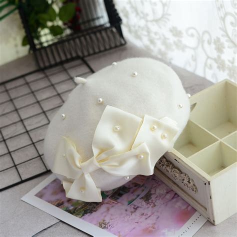 日系文艺白色珍珠蝴蝶结烧饼贝雷帽羊毛呢子立体女帽子lolita复古 虎窝淘
