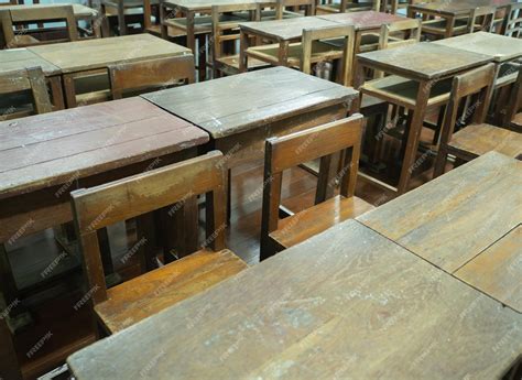 Premium Photo Wooden Tables And Chairs In An Old Rural Elementary