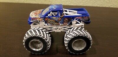 HOT WHEELS MONSTER JAM TRUCK SCALE STONE CRUSHER HOLIDAY EDITION