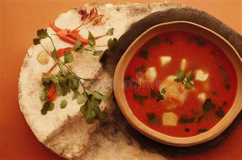 Tomato Seafood Soup With Mussels And Addition Of Shrimp And Aromatic