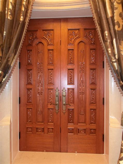 A Pair Of Wooden Doors With Curtains On Either Side