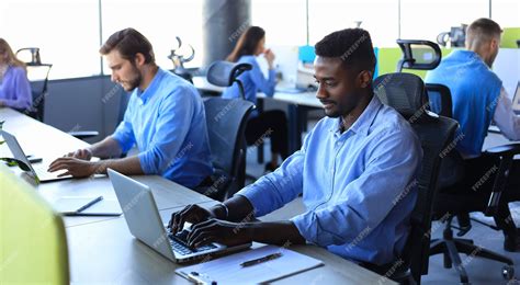 Premium Photo Modern Business Men Analyzing Stock Market Data While Working In The Office