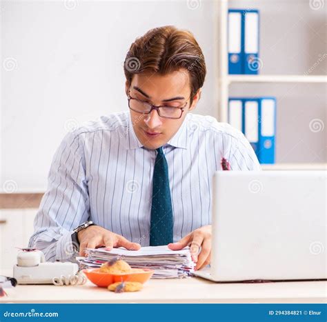Employee Eating Food With Cockroaches Crawling Around Stock Image