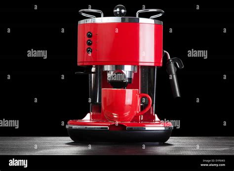 Red coffee machine Stock Photo - Alamy