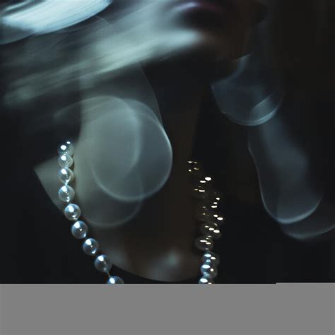 A Woman Wearing A Necklace Premium Ai Generated Image