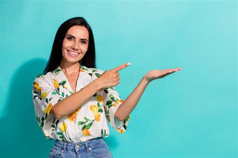 Photo Of Adorable Pretty Girl Wear Stylish Clothes Two Arm Presenting