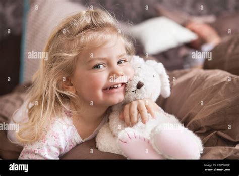 Portrait Of Girl With Her Cuddly Toy Stock Photo Alamy