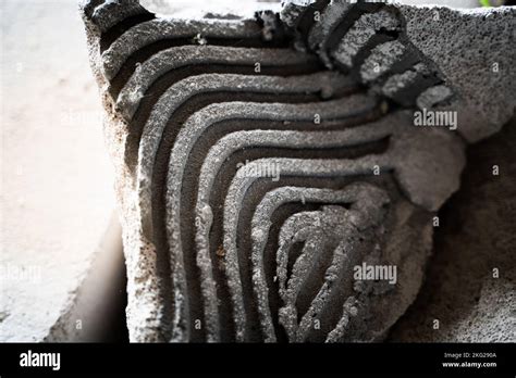A Layer Of Glue On A Dismantled Aerated Concrete Block Close Up The