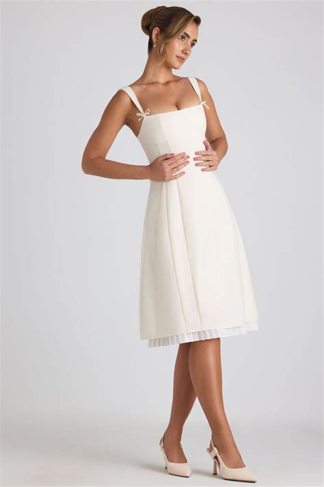 Isadora Bow Detail Pleated A Line Midi Dress In Ivory Oh Polly