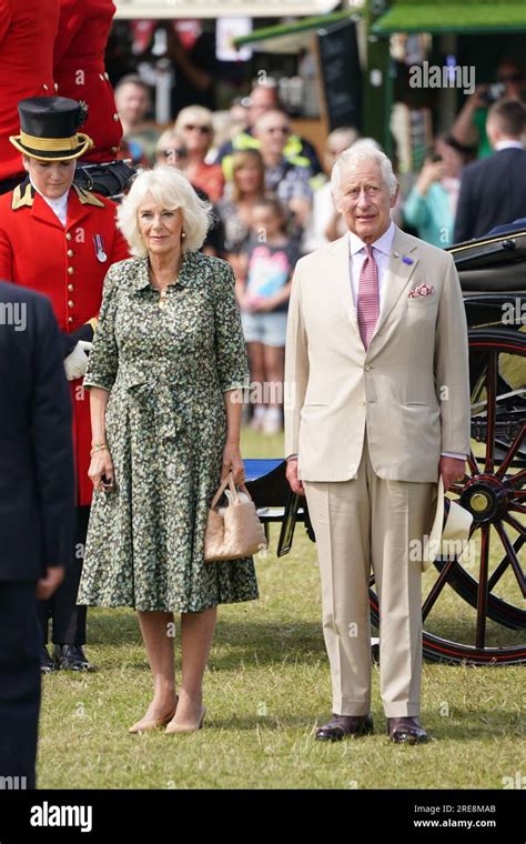 King Charles Iii And Queen Camilla Stand For The National Anthem During