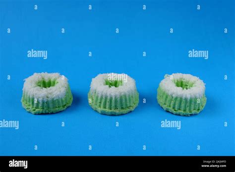 Putri Ayu Cake Isolated On A Blue Background A Traditional Indonesian