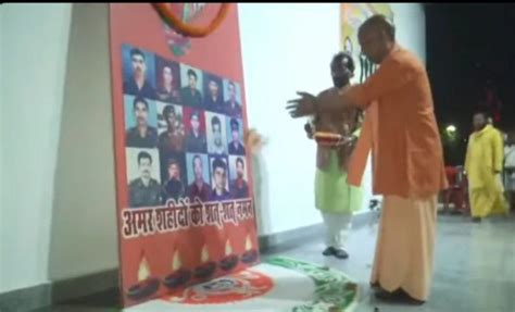 Chief Minister Yogi Adityanath Lit First Diya And Paid Floral Tributes