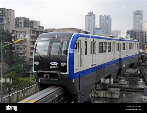 Monorail Train Approaches Sigongli Station On Chongqing Metro Line 3