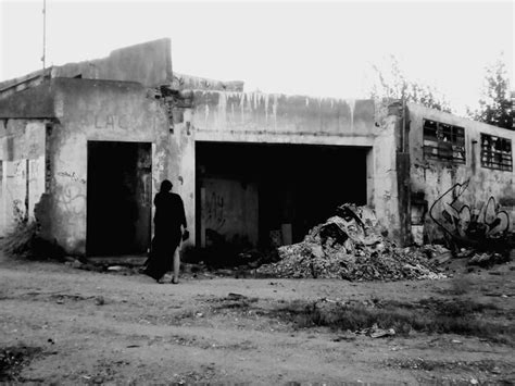 Premium Photo View Of A Woman Standing On Built Structure