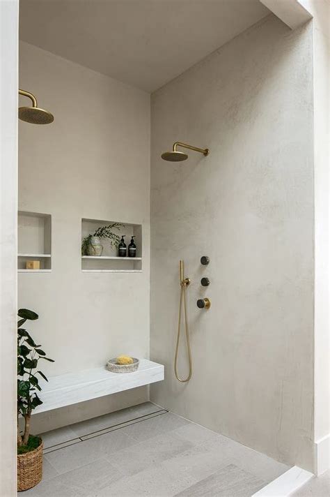 Lime Plaster Shower Walls With Brass Infinity Shower Drain