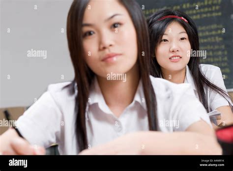 Female Babe Taking Notes In Class Stock Photo Alamy