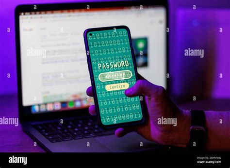 Person Typing Password On Smartphone In Laptop Background Digital