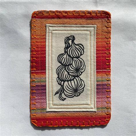 Garlic Braid Thing In The Dirt