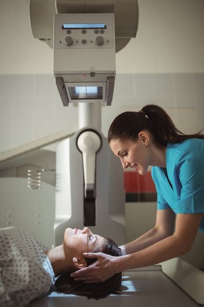 Premium Photo Female Patient Undergoing An X Ray Test