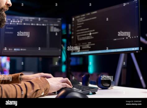 Programmer Typing Lines Of Code Using Keyboard Filtering Malicious Traffic From Cybercriminals