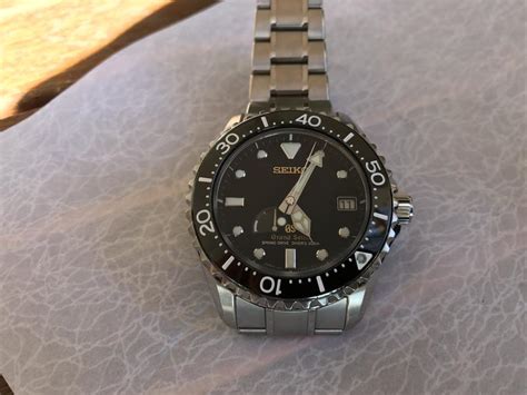 vendo grand seiko sbga031 spring drive titanio diver s 200 m