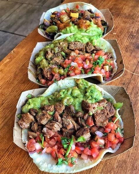 Burritos With Meat Guacamole And Salsa Assorted Mexican Street Food