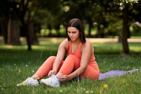 Free Photo Full Shot Woman Sitting On Yoga Mat