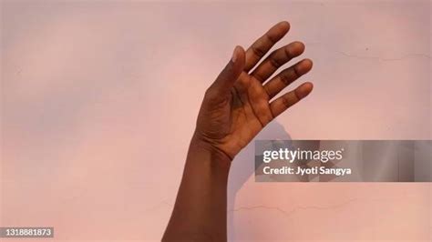 Brown Skin Hand Photos And Premium High Res Pictures Getty Images