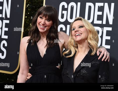Kate Mckinnon Right And Her Sister Emily Lynne Berthold Arrive At The
