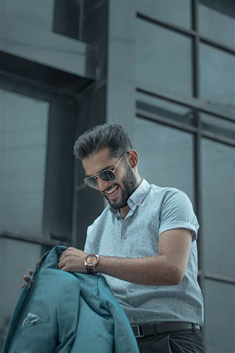 Man In Blue Crew Neck T Shirt Wearing Black Sunglasses Photo Free