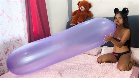 Sexy Camylle B To Pop Your Huge Purple Cattex Zeppelin Balloon