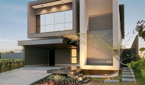 Fachada de casa contemporânea cinza volumetria e vidro refletivo