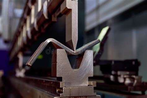 Work On A CNC Bending Machine In A Factory Sheet Metal Bending On A